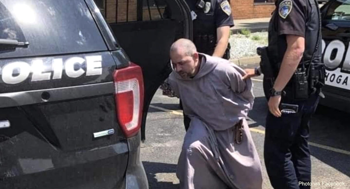 Catholic priest found guilty of blocking entrance to abortion facility ...